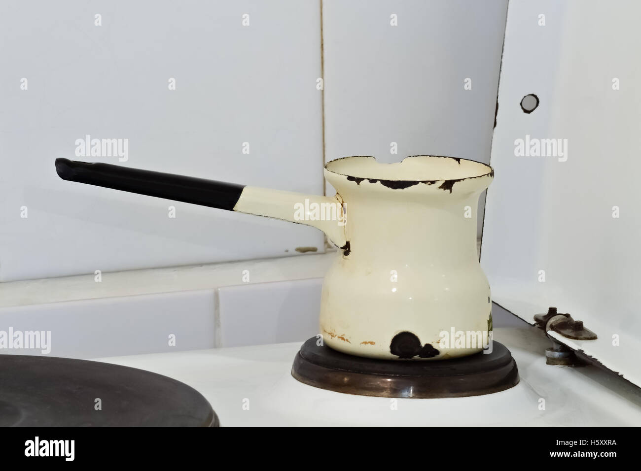 Closeup of a traditional coffee pot placed on a domestic stove Stock ...