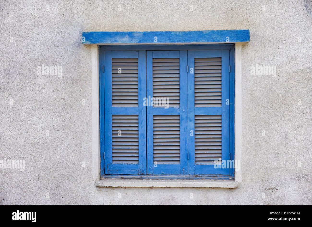 Old window with closed shutters. Closeup Stock Photo - Alamy