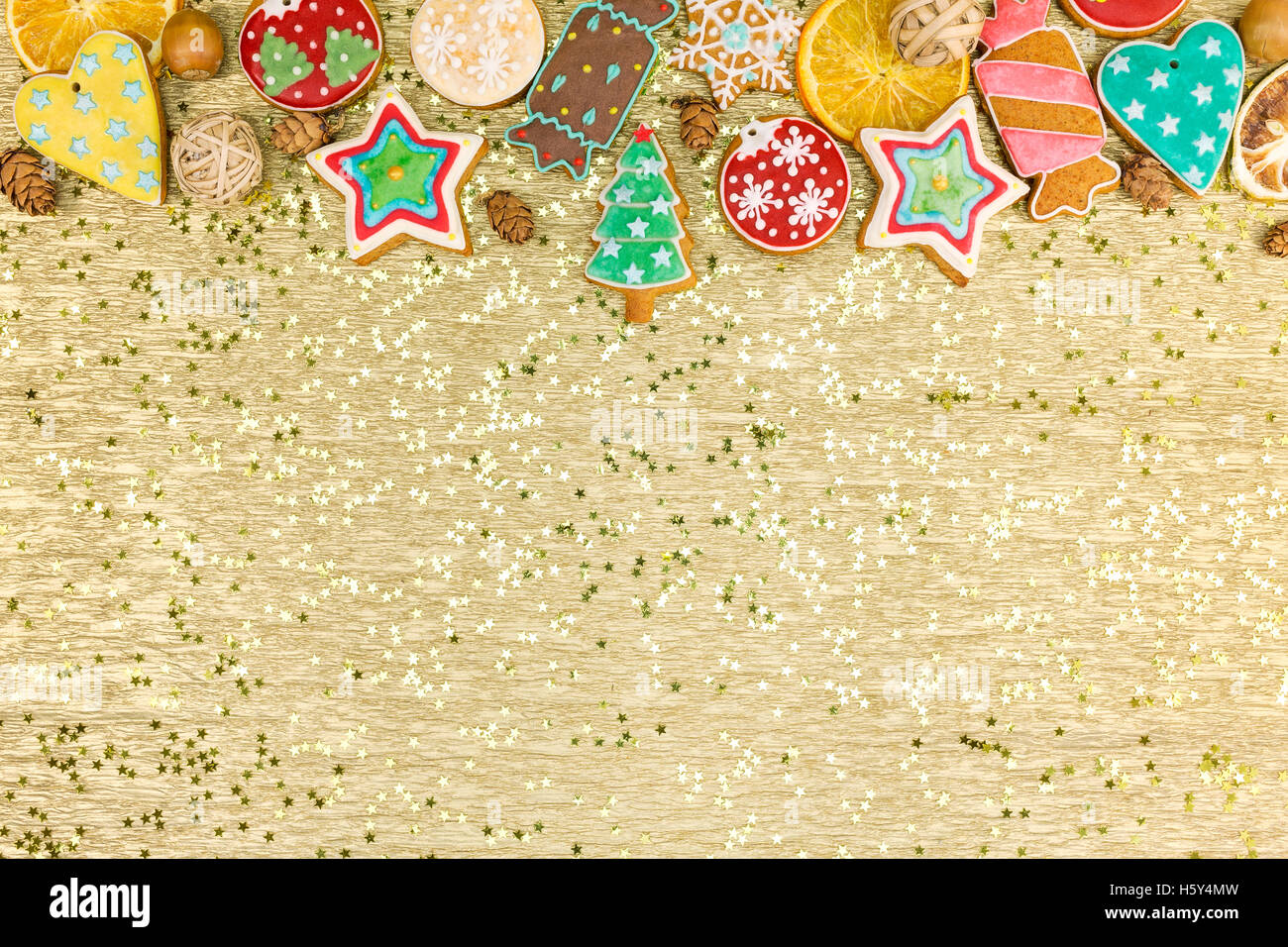 christmas border with various gingerbread cookies and dried orange on ...