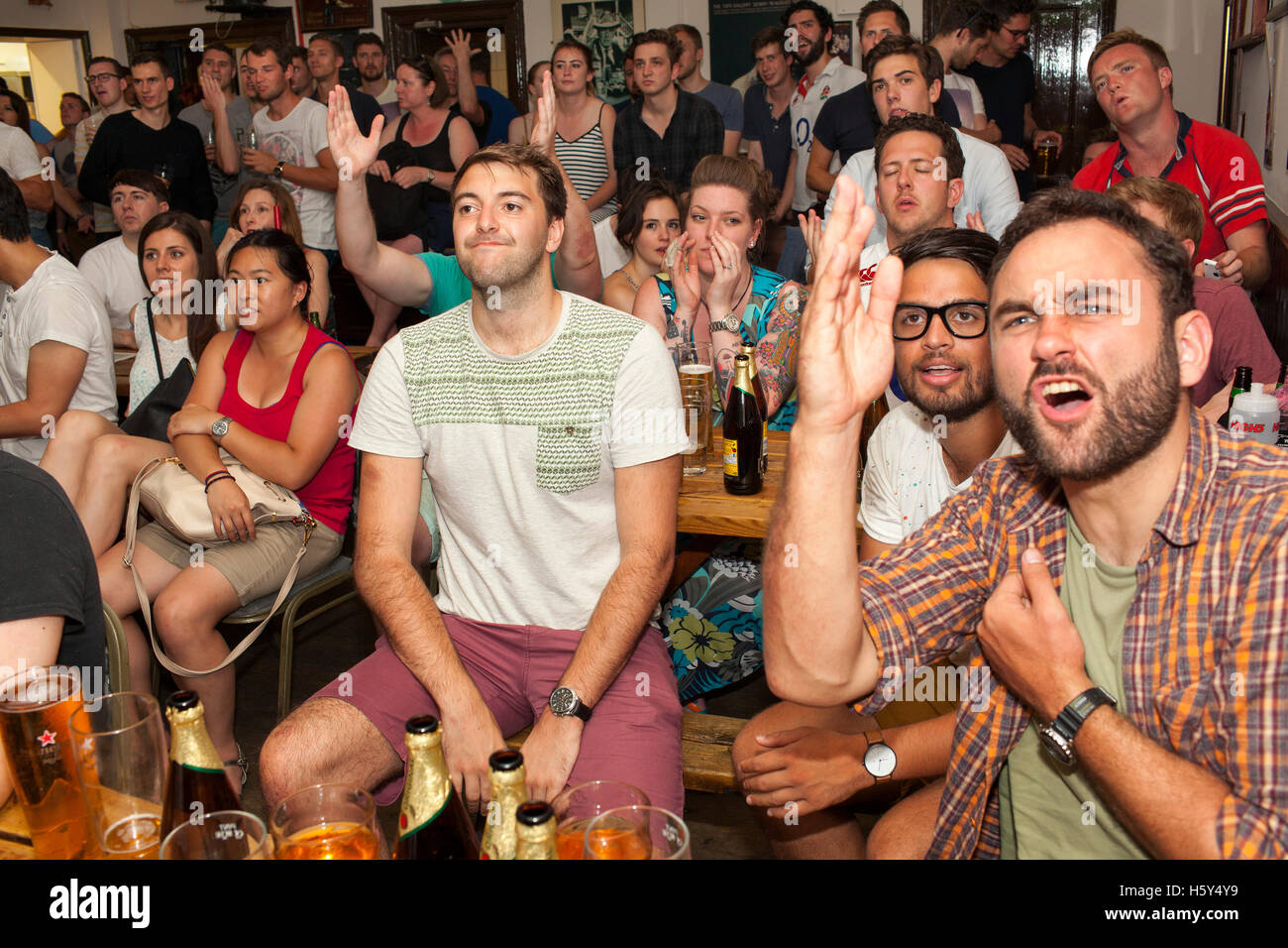 England rugby fans watch a world cup warm up game against France in the ...