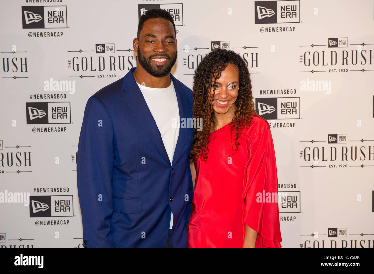 Justin Tuck of the Oakland Raiders and Lauran Tuck arrive on the red ...