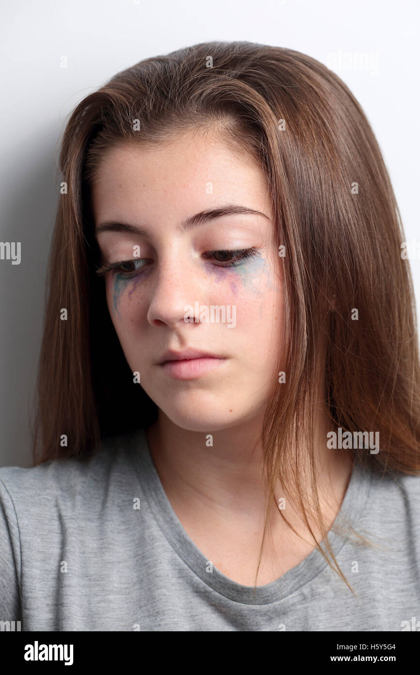 Portrait of a teenager with a serious face. Capture vertical light of ...