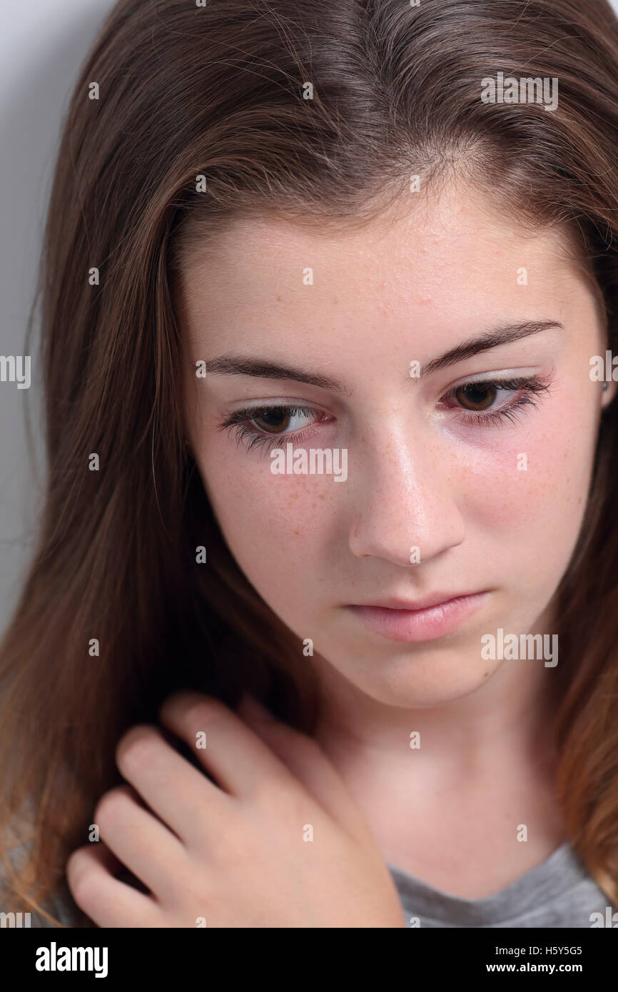 Portrait of a teenager with a serious face. Capture vertical light of ...
