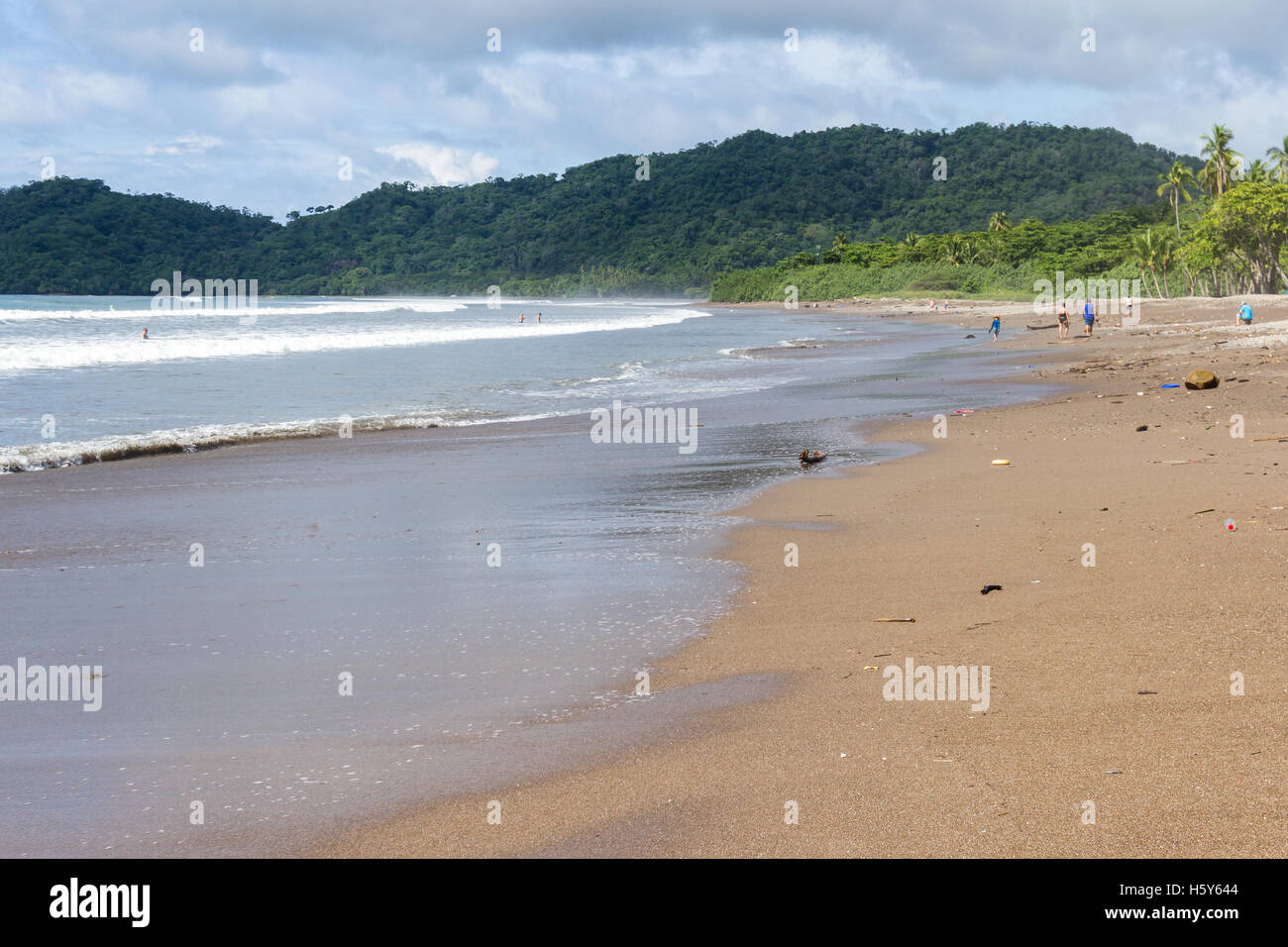 Tambor, Costa Rica - June 25: Tranquil beach scene with people enjoying ...
