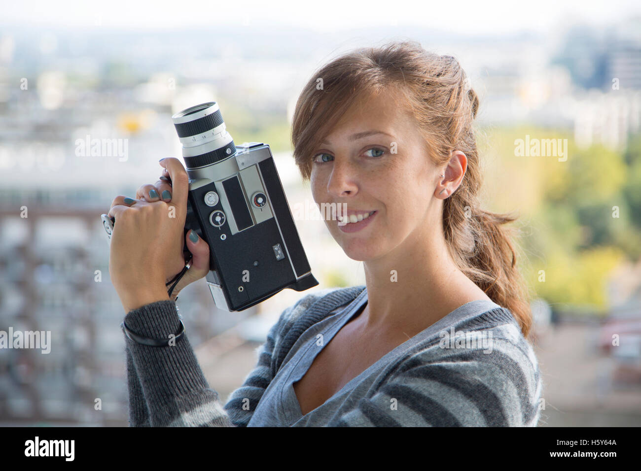 Motion video young woman holding hi-res stock photography and images ...