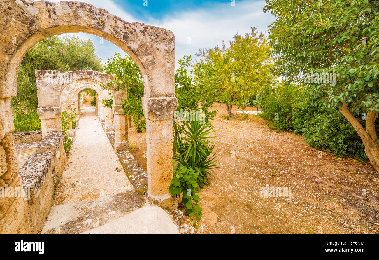 gallery of arches in garden in Italy Stock Photo - Alamy