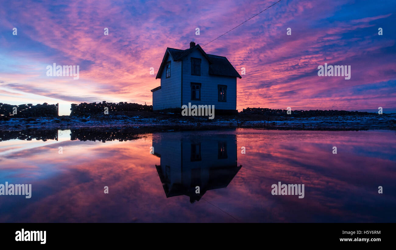 a small house surrounded by lovely morning light. And it all reflects ...