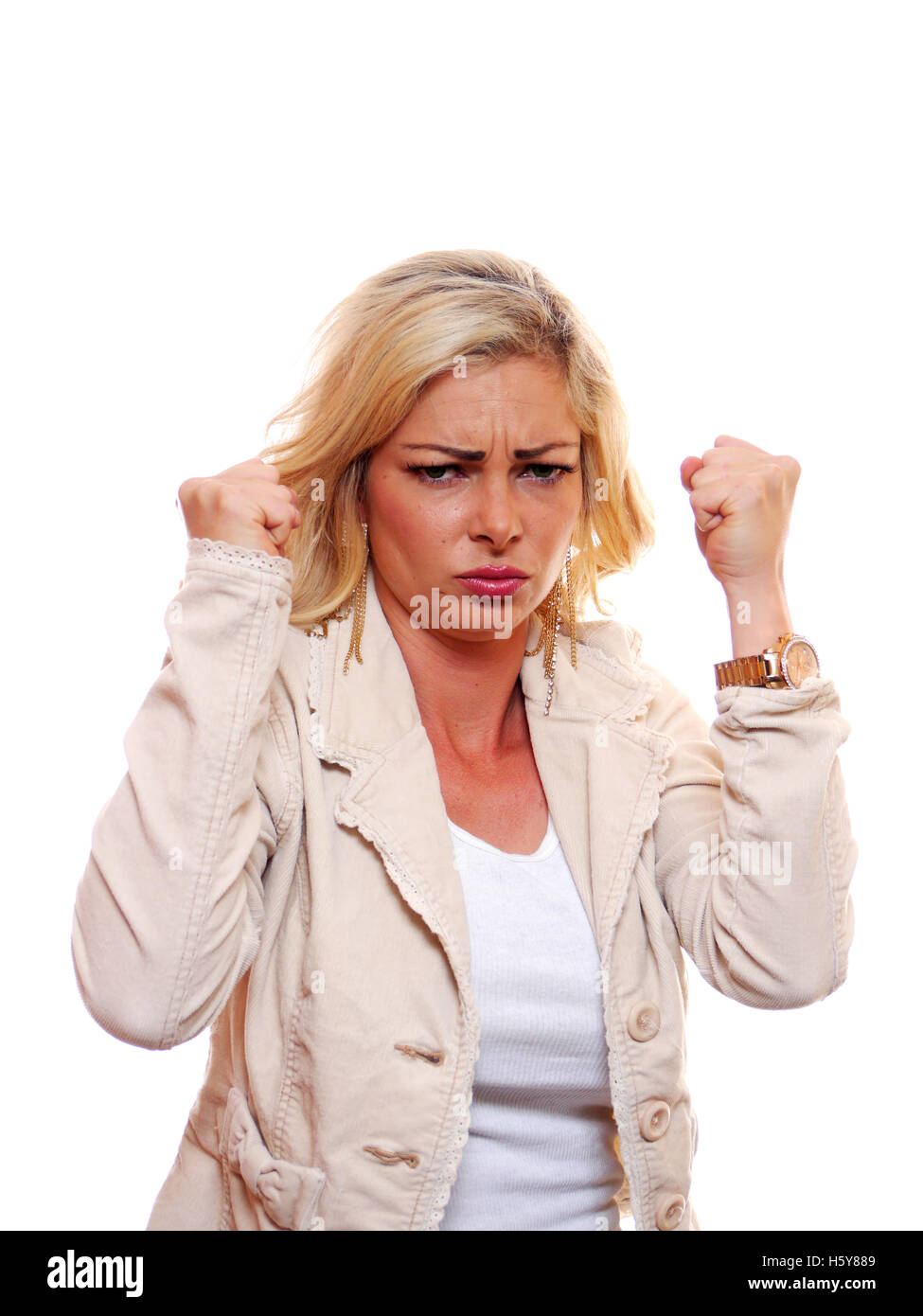 Image of a angry, frustrated blond model looking into the camera Stock ...