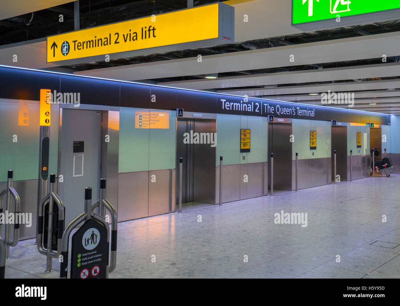 Elevator to terminals at London Heathrow Stock Photo - Alamy