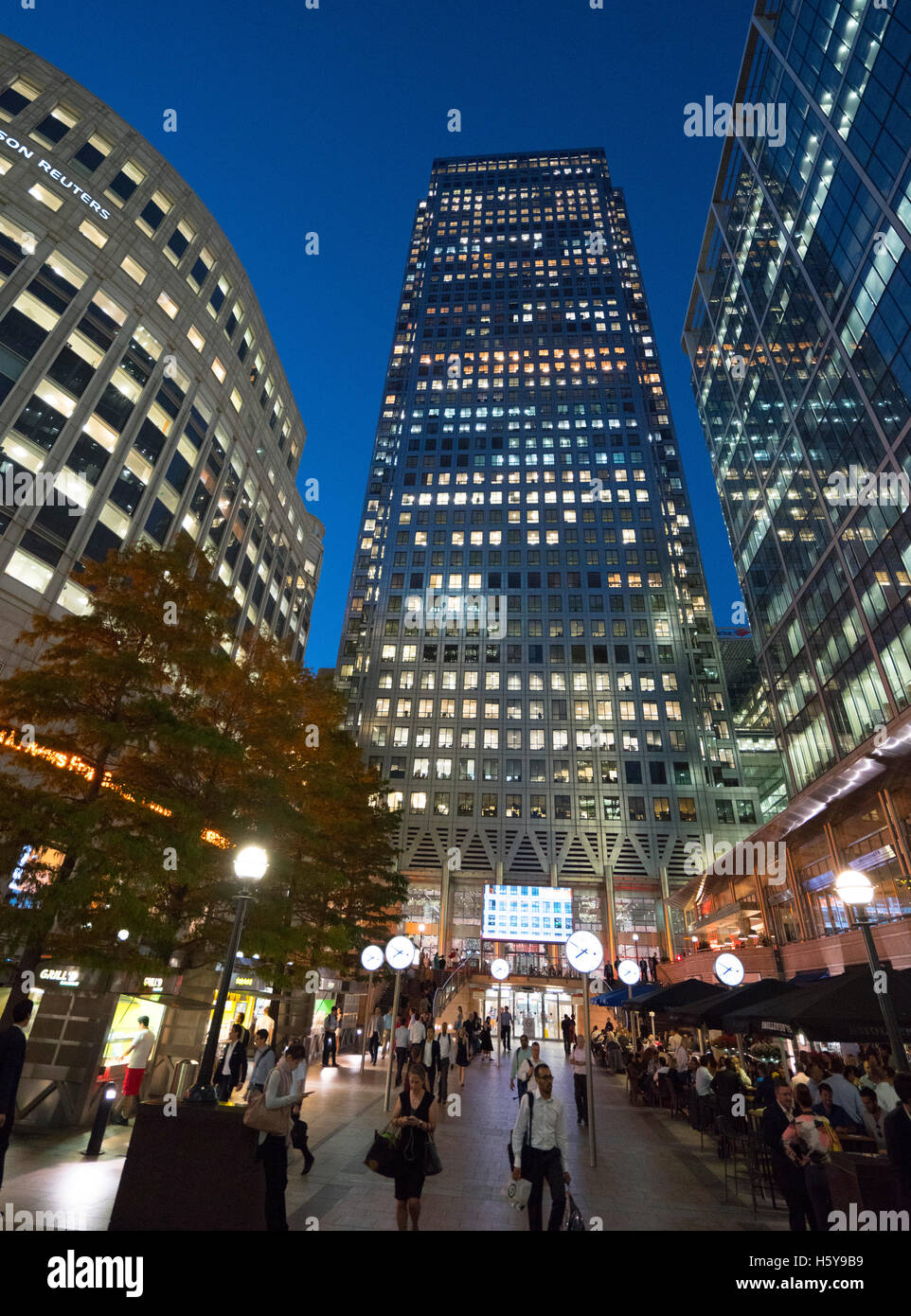 Reuters building and One Canady Building by night Stock Photo - Alamy