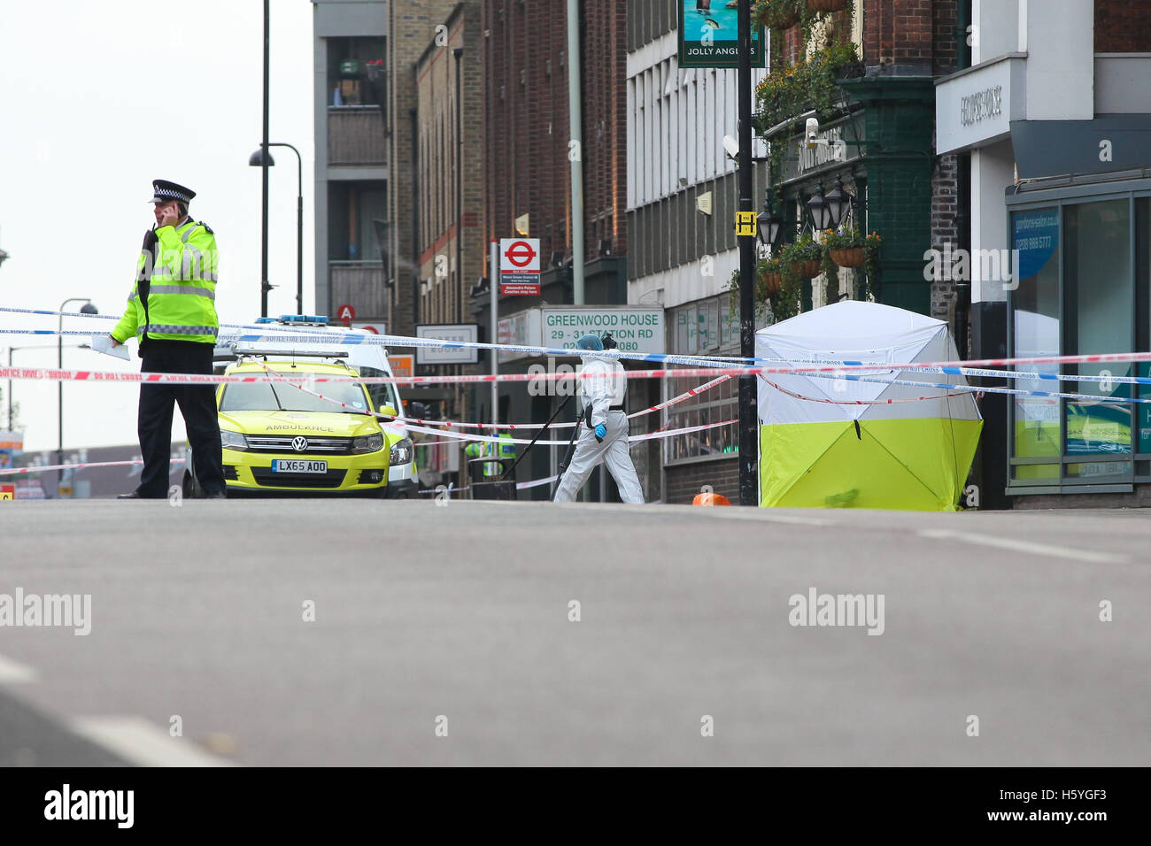 A police officer outside wood street station hi-res stock photography ...