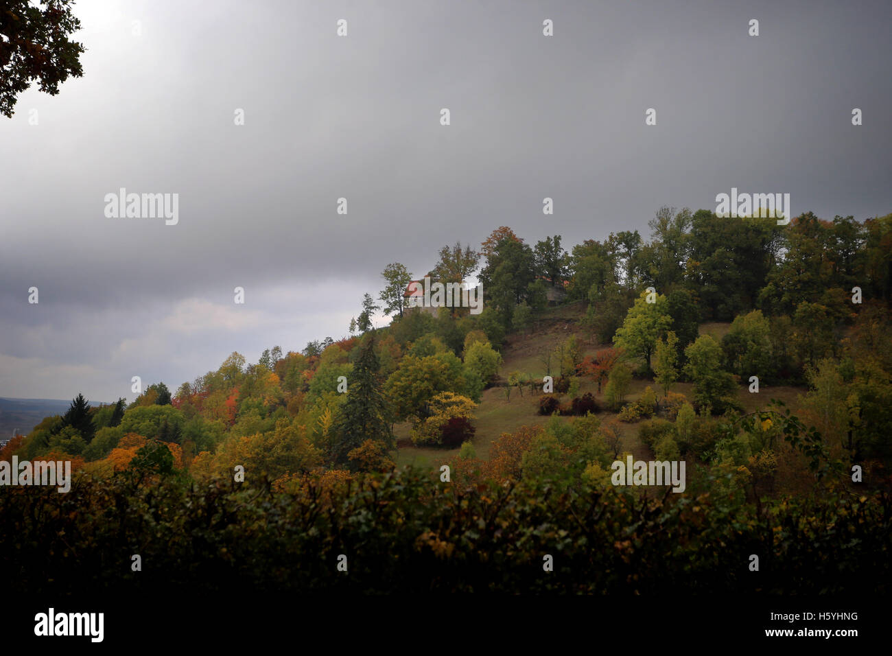 Koenigsberg castle can be seen below dark rain clouds on Schlossberg ...