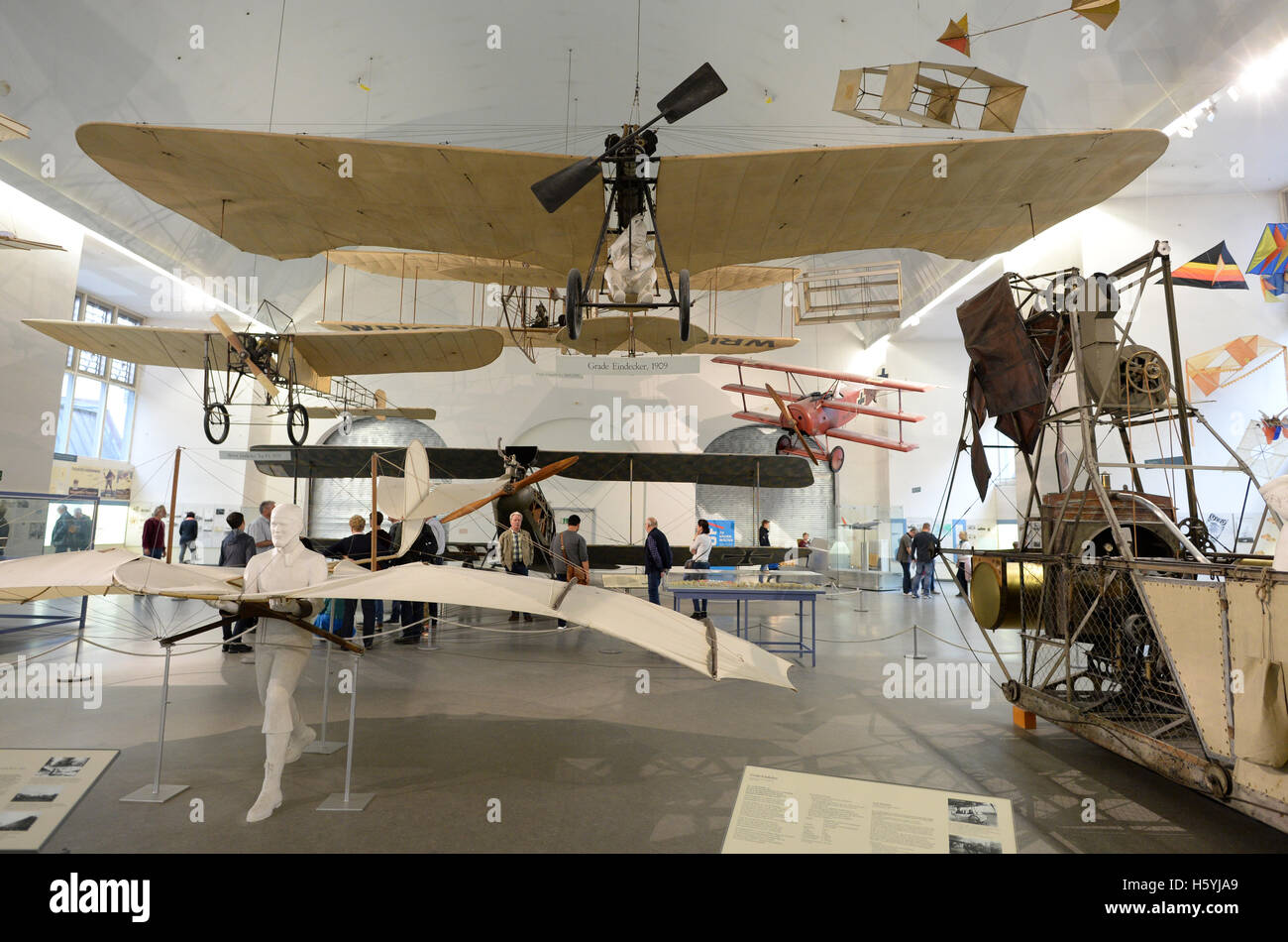 Munich, Germany. 11th Oct, 2016. Visitors standing behind the monoplane ...