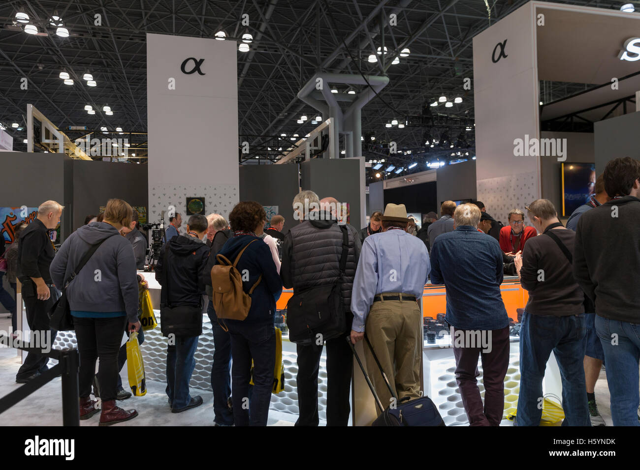New York, USA. 22nd October, 2016. Visitors examine Sony Alpha line of ...