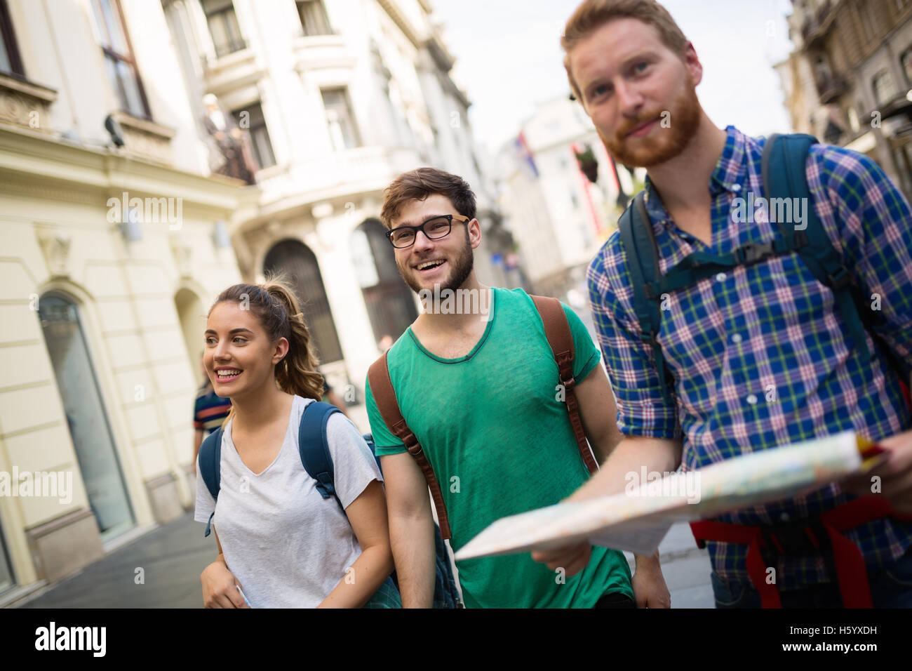 Group friends exploring city hi-res stock photography and images - Alamy