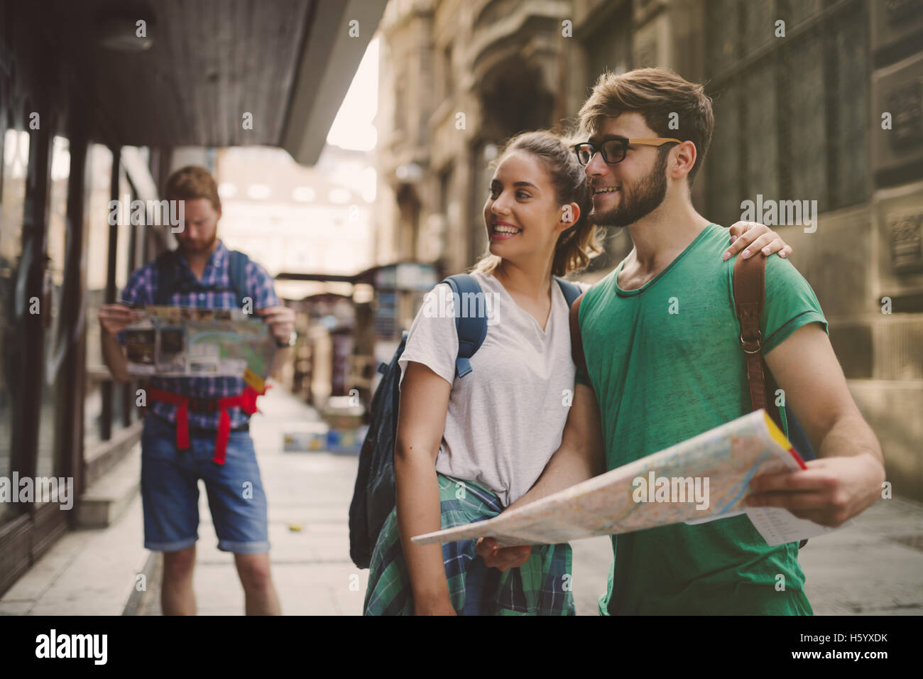 Group friends exploring city hi-res stock photography and images - Alamy