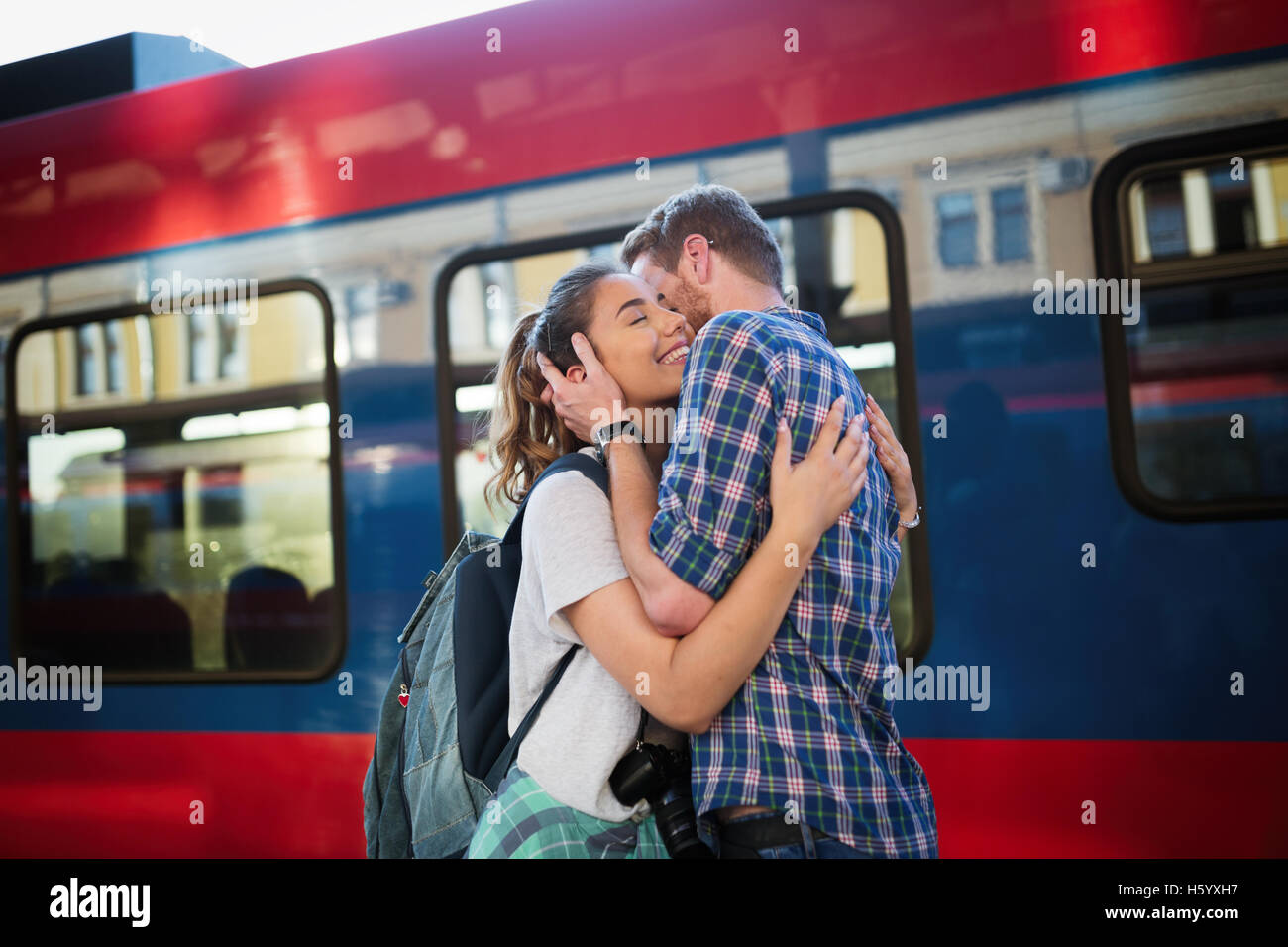 Couple saying goodbye hi-res stock photography and images - Alamy