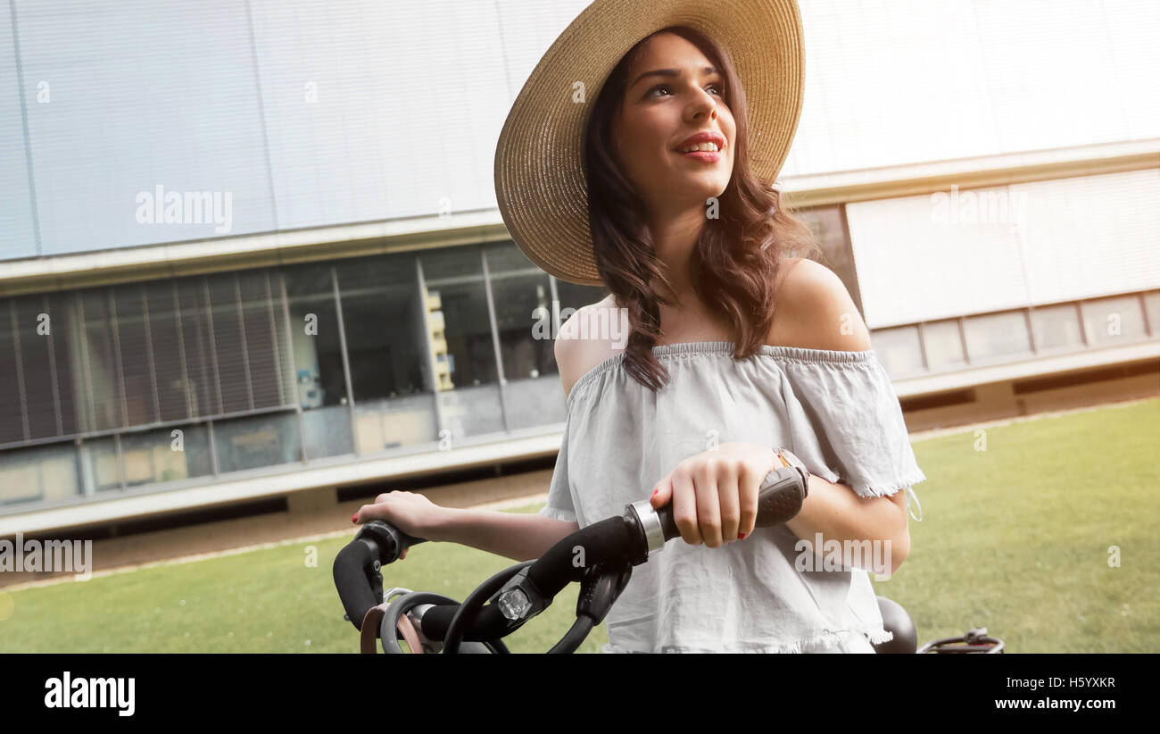 Woman bike sun hi-res stock photography and images - Alamy