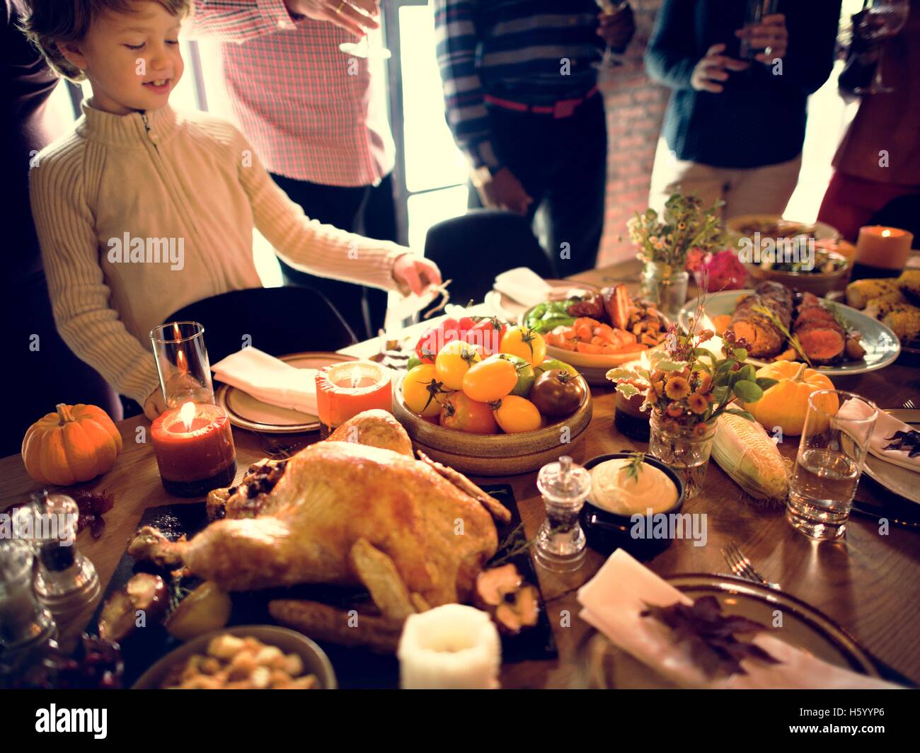 People Celebrating Thanksgiving Holiday Tradition Concept Stock Photo ...