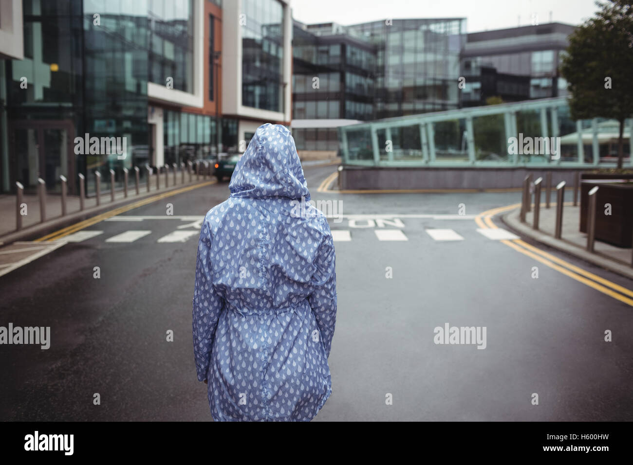 Woman standing on street hi-res stock photography and images - Alamy