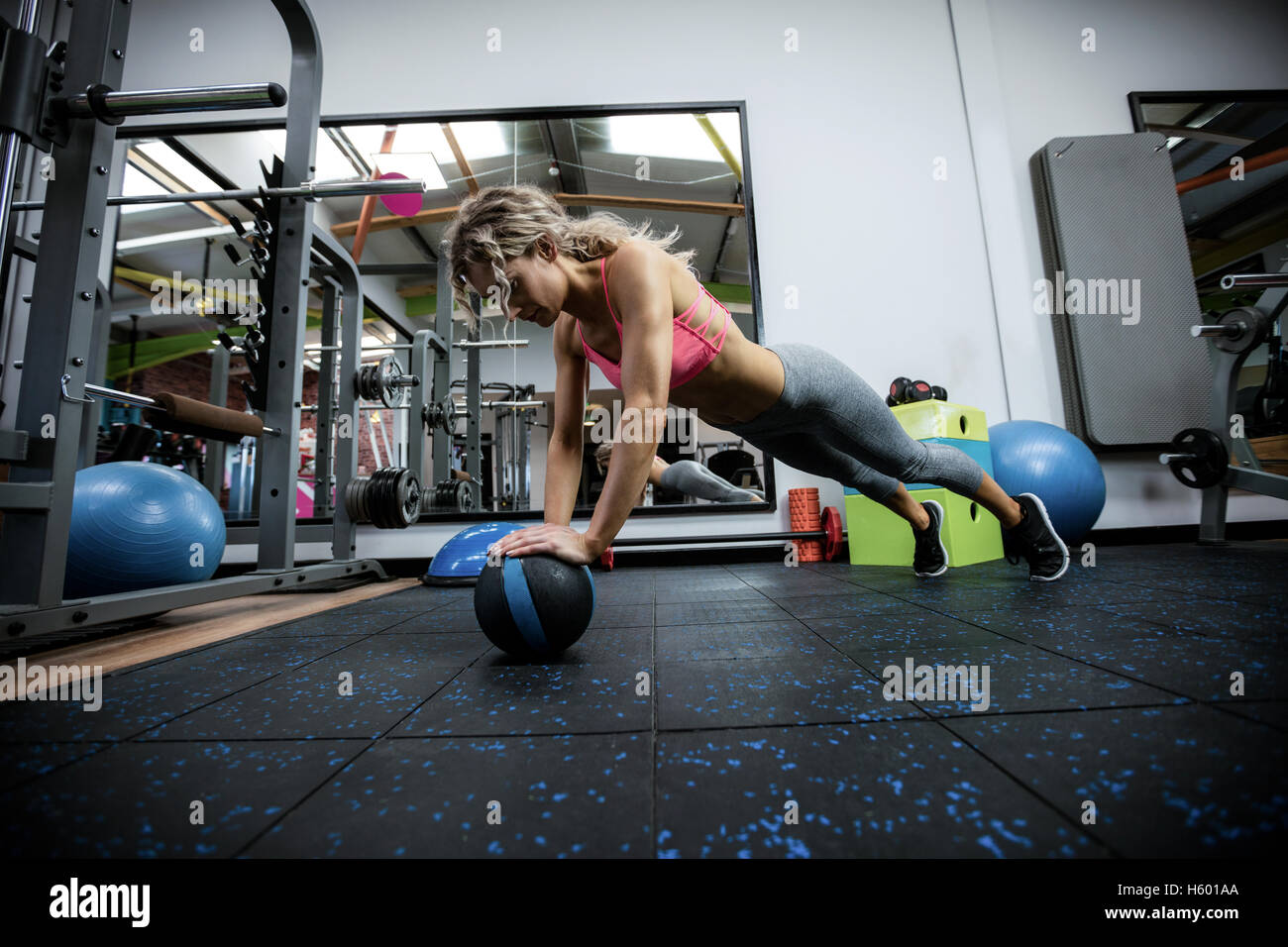 Woman performing push up exercise hi-res stock photography and images ...