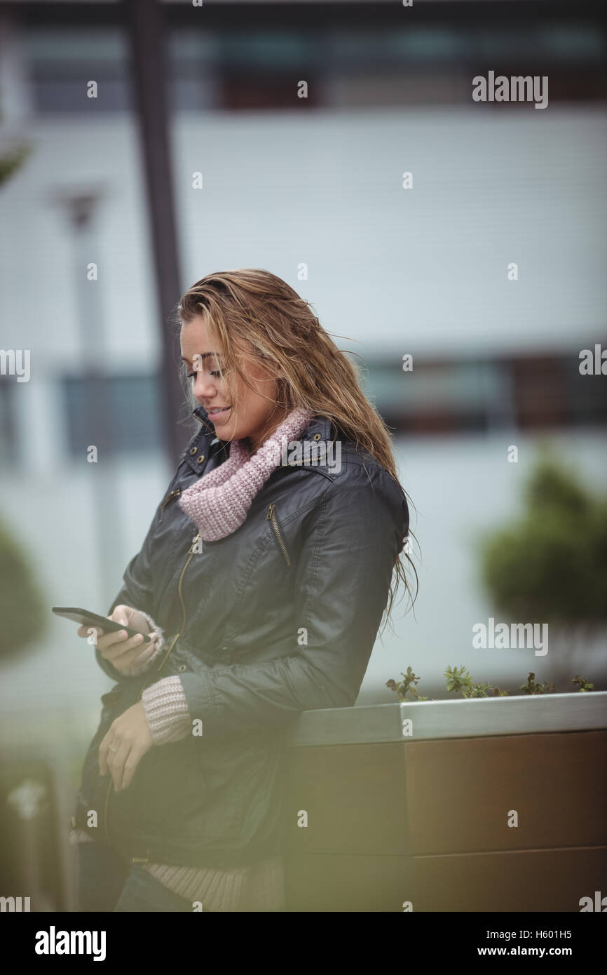Beautiful woman using mobile phone Stock Photo - Alamy