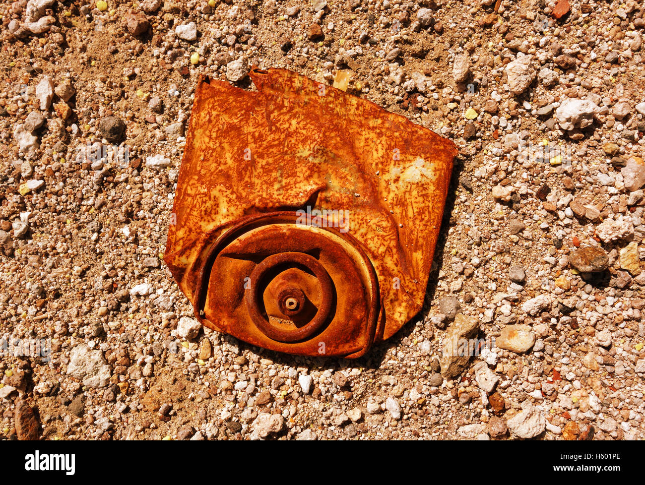 Old crushed rusty spray on dusty background Stock Photo - Alamy