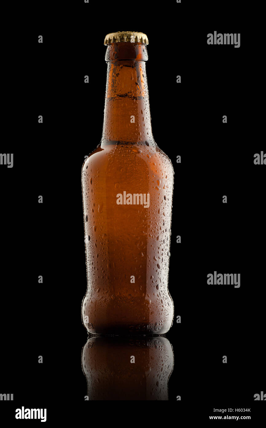 Wet Beer Bottle Isolated on Black Background Stock Photo - Alamy