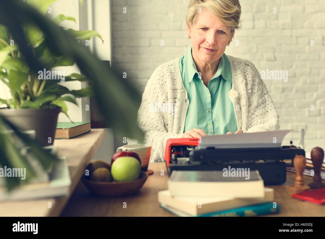 Senior Adult Using Typerwriter Typing Concept Stock Photo - Alamy