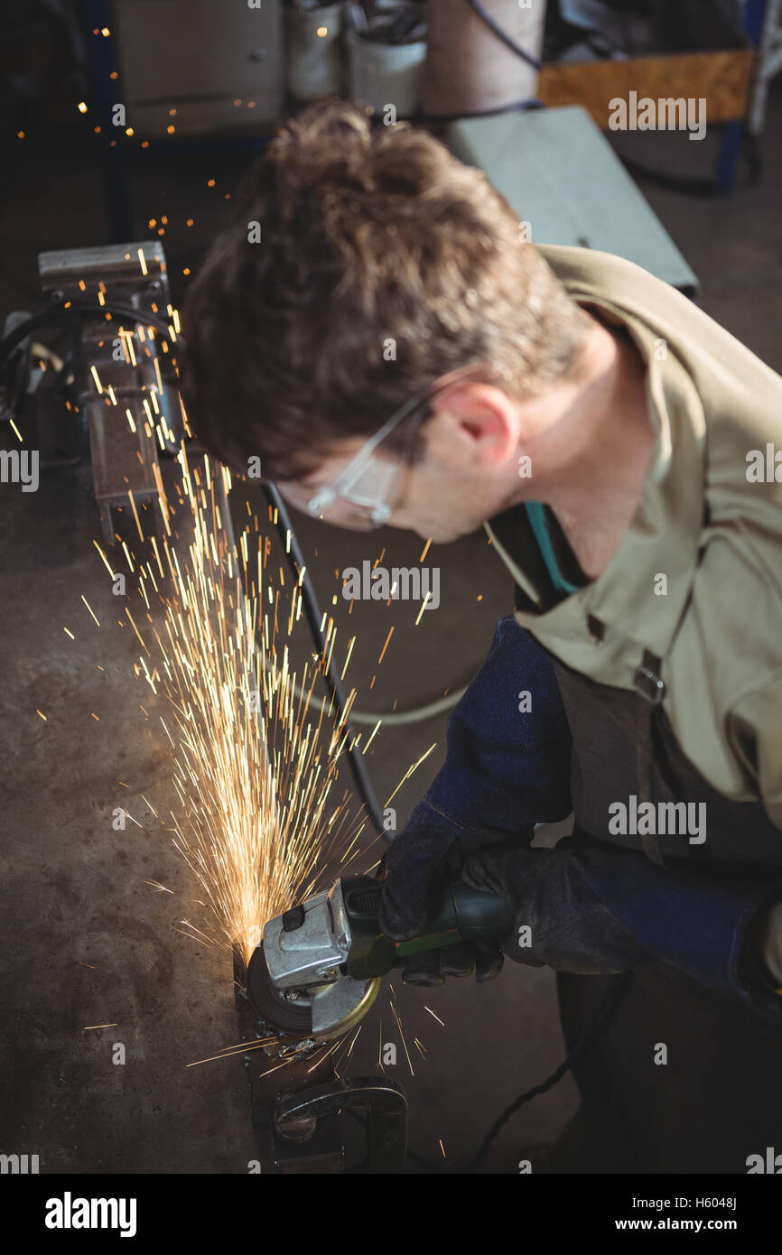 Welder working at work shop Stock Photo - Alamy