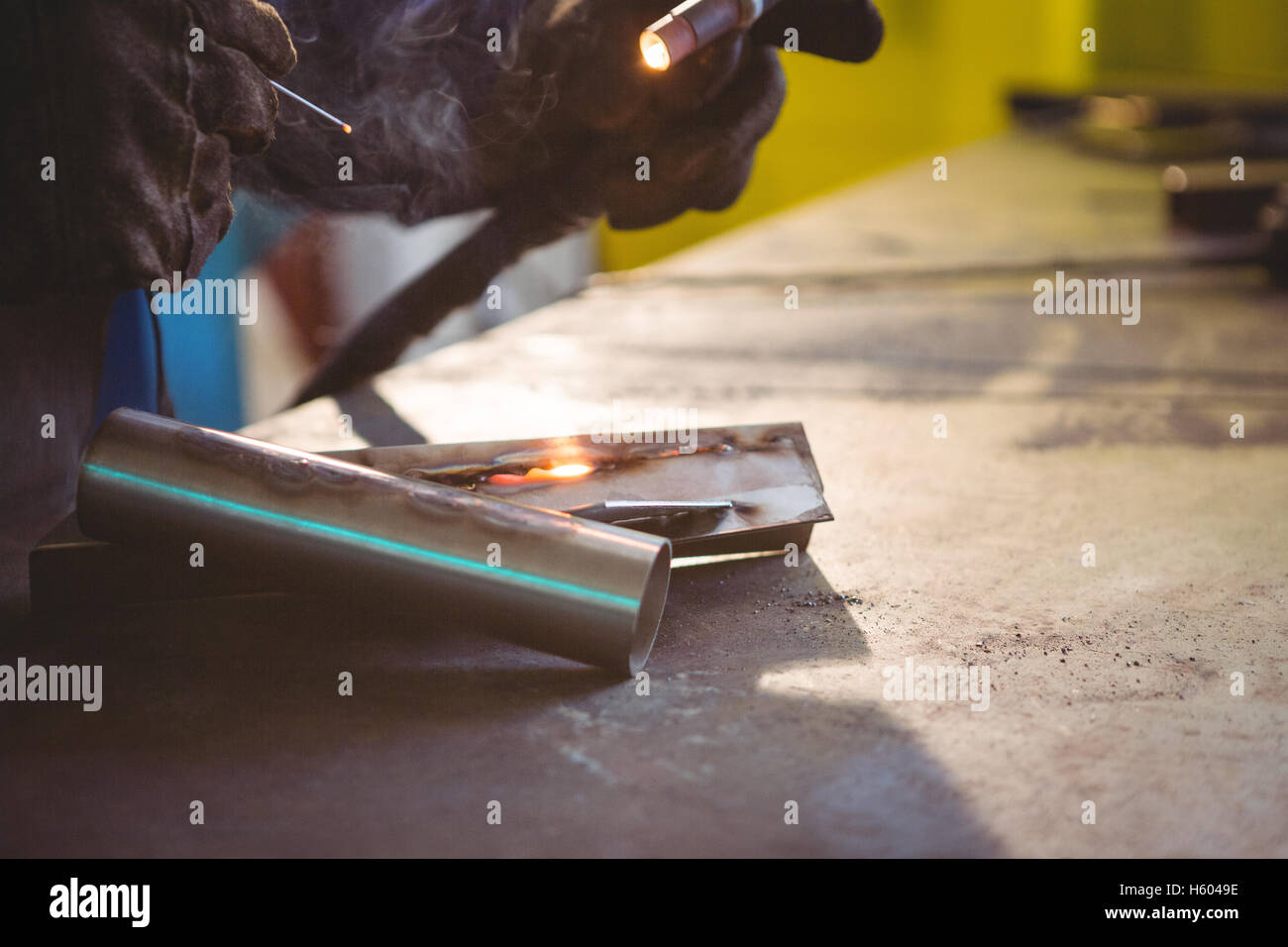 Welder welding a metal Stock Photo - Alamy