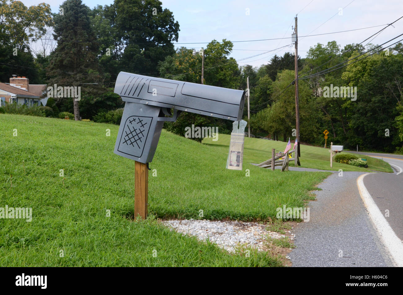 Gun shaped mail box pennsylvania on grass verge hi-res stock ...