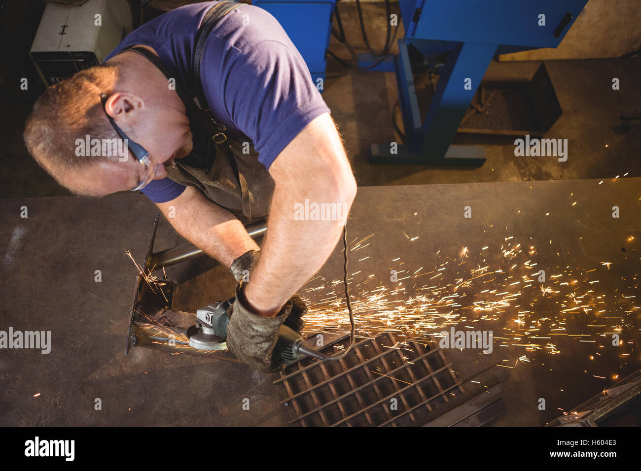 Welder working at work shop Stock Photo - Alamy