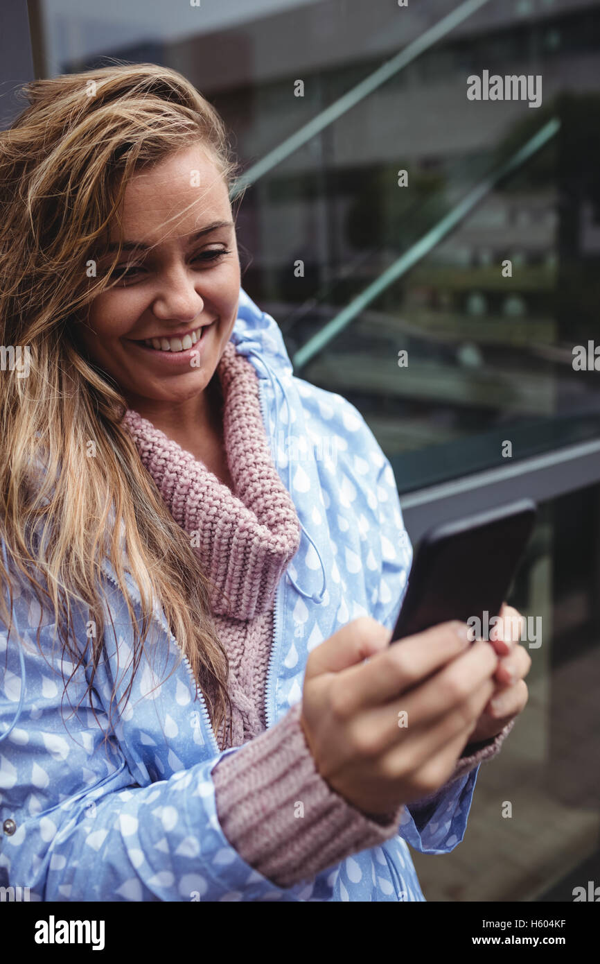 Beautiful woman using mobile phone Stock Photo - Alamy