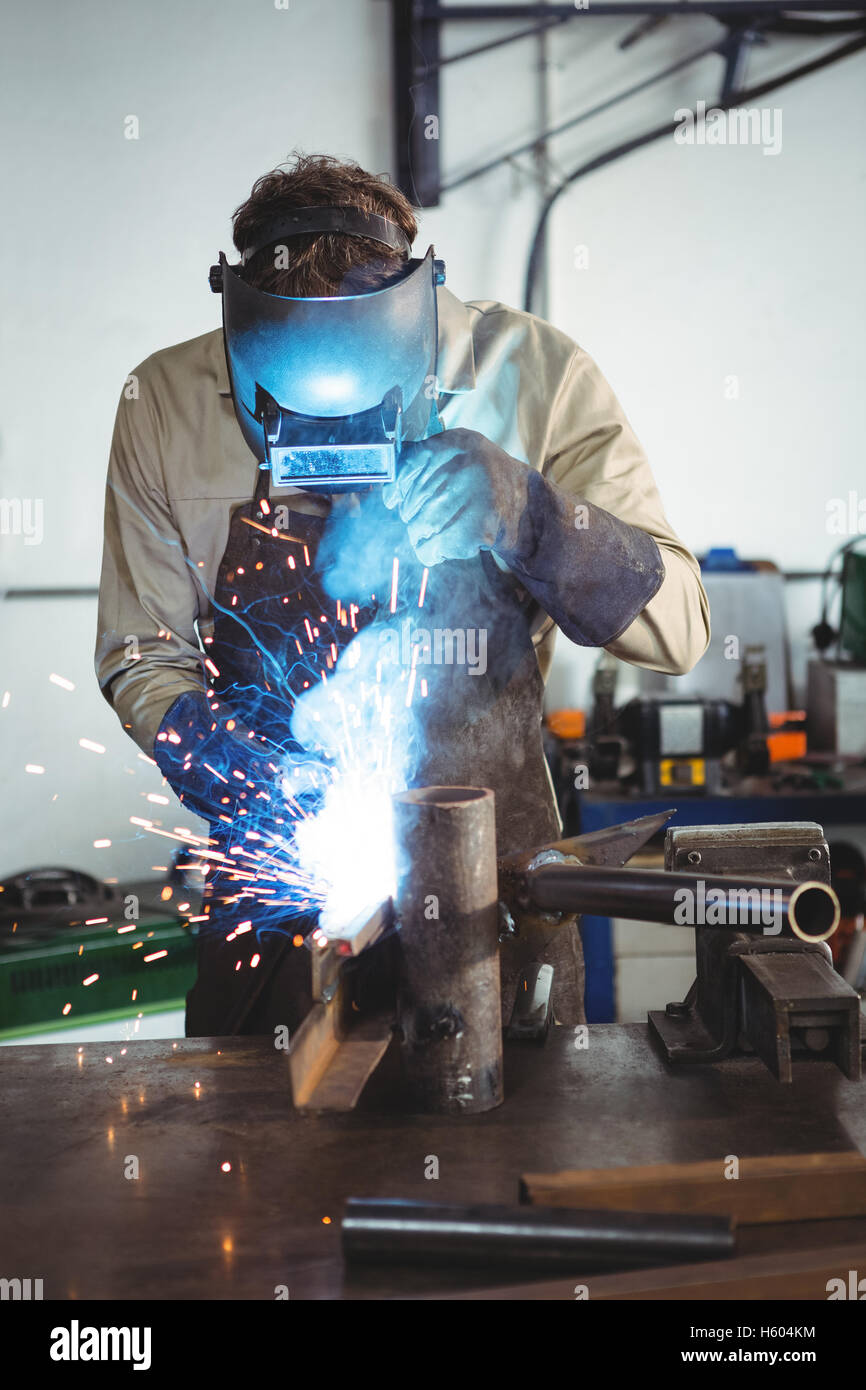 Welder welding a metal Stock Photo - Alamy
