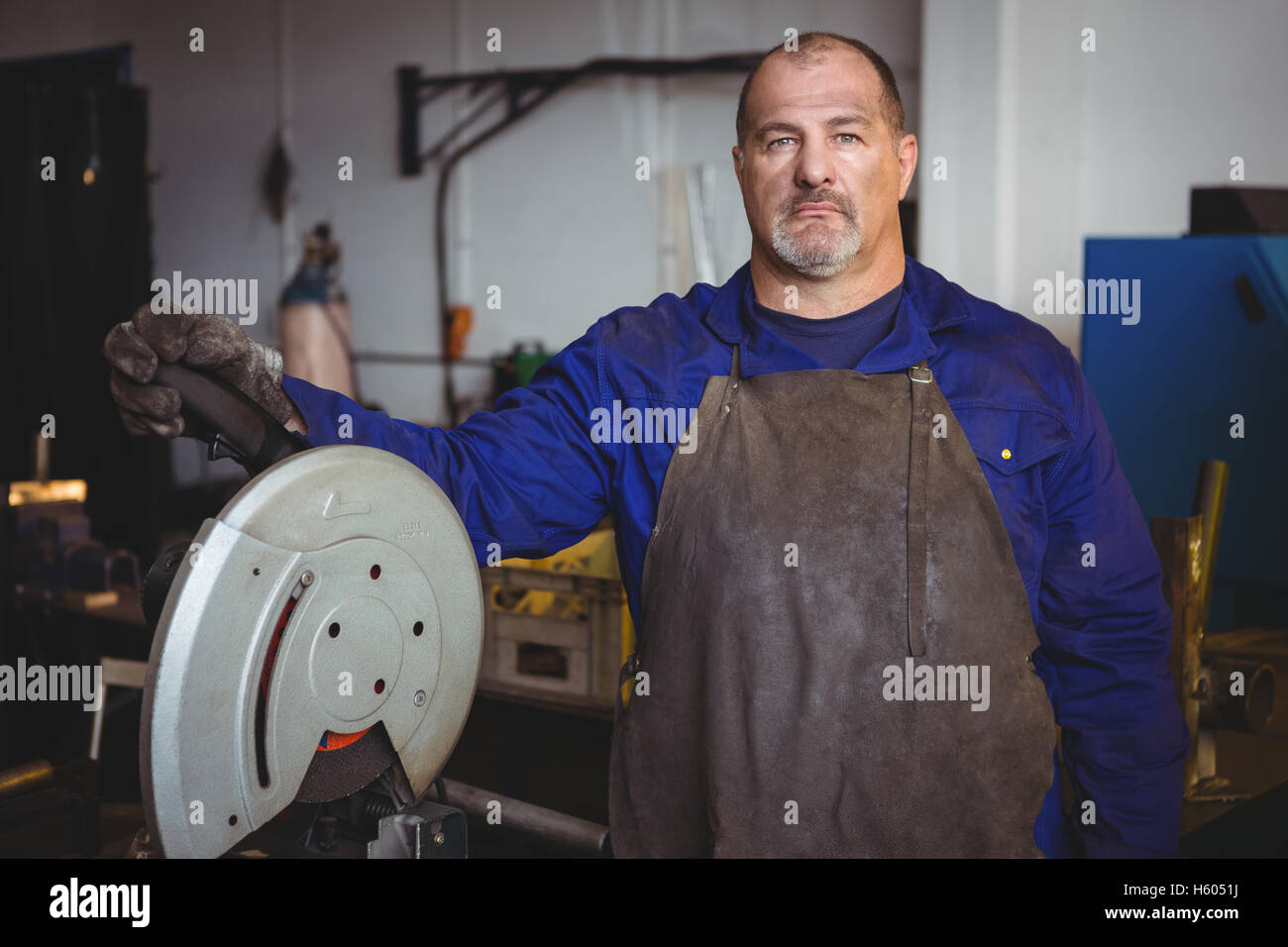 Welder standing in workshop Stock Photo - Alamy