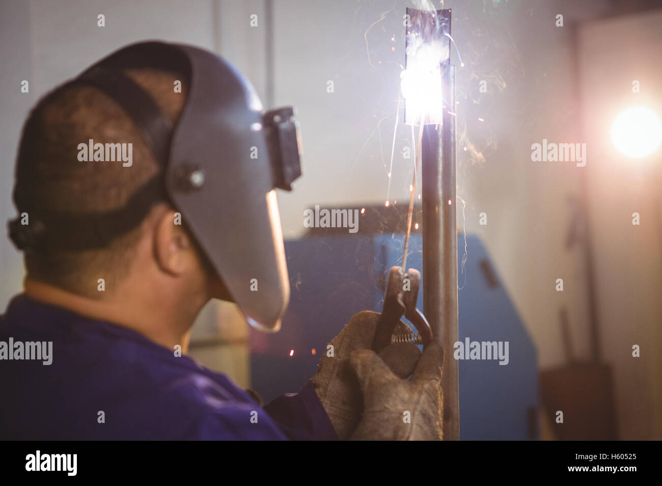 Welder welding a metal Stock Photo - Alamy