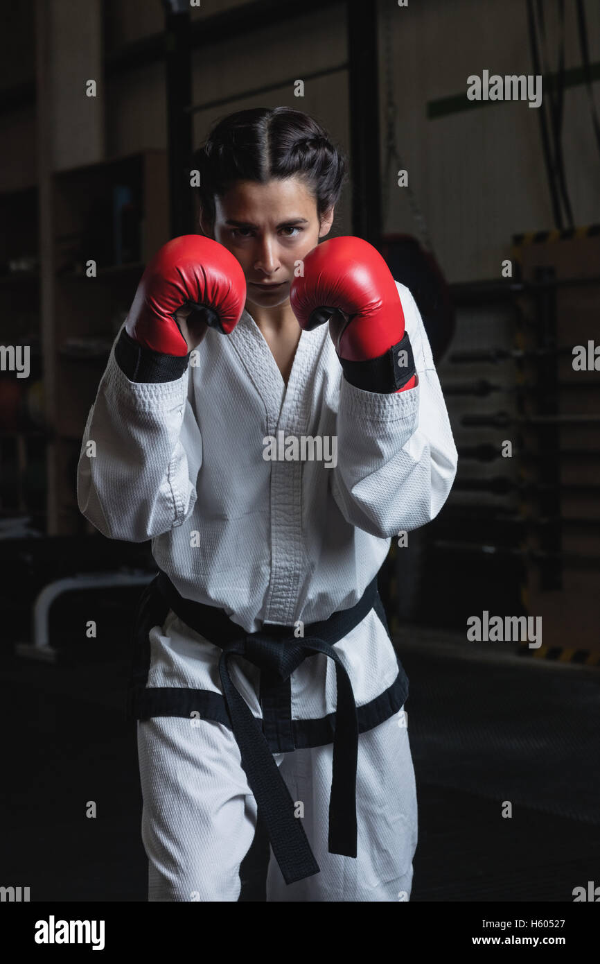 Portrait of woman in boxing gloves Stock Photo - Alamy