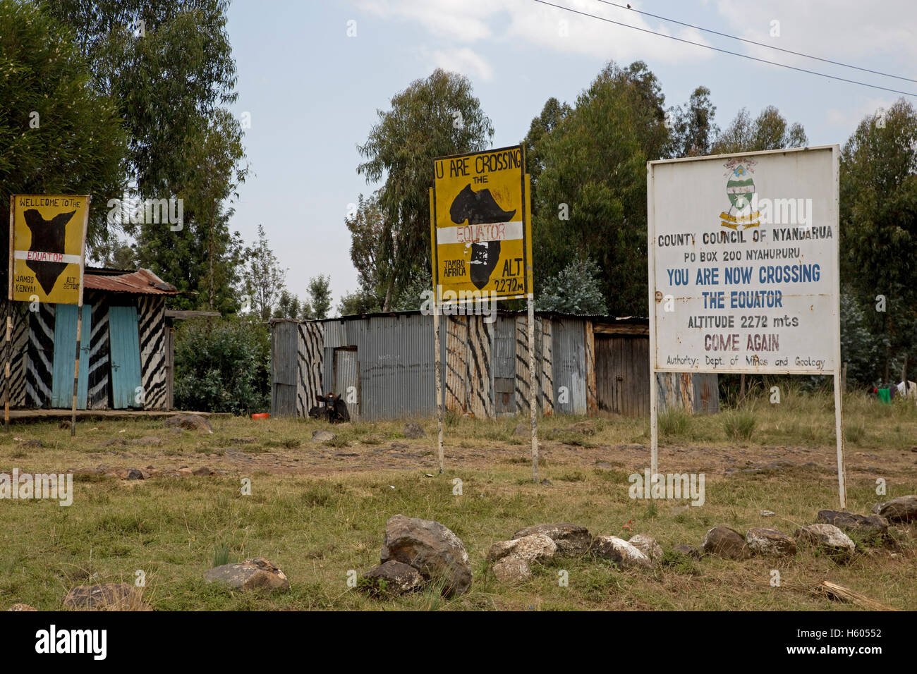 Equator signboards roadside near Nanuki Kenya Stock Photo - Alamy