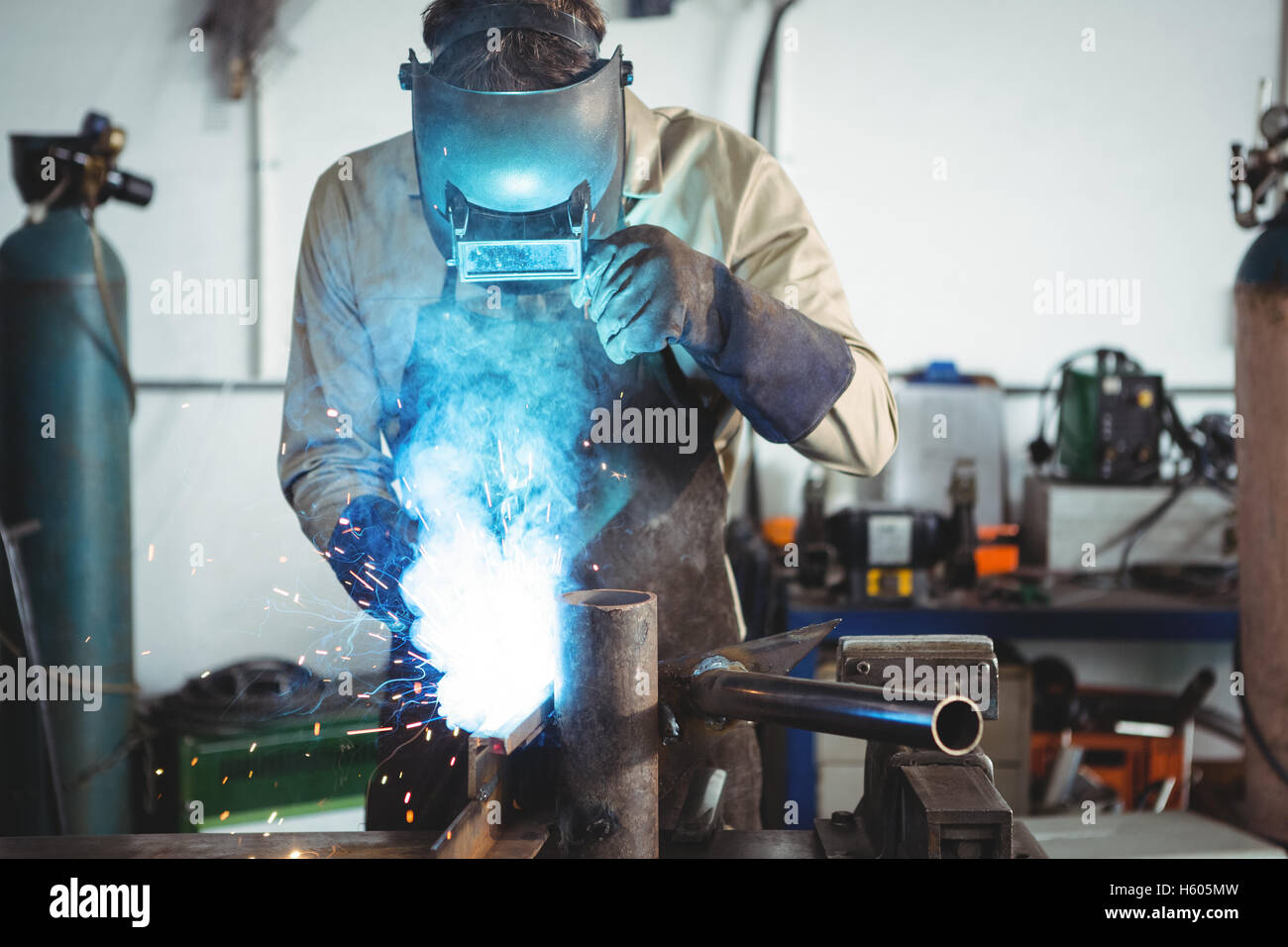 Welder welding a metal Stock Photo - Alamy