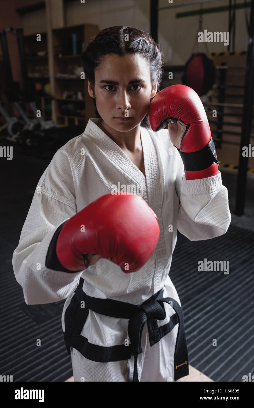 Portrait of woman in boxing gloves Stock Photo - Alamy