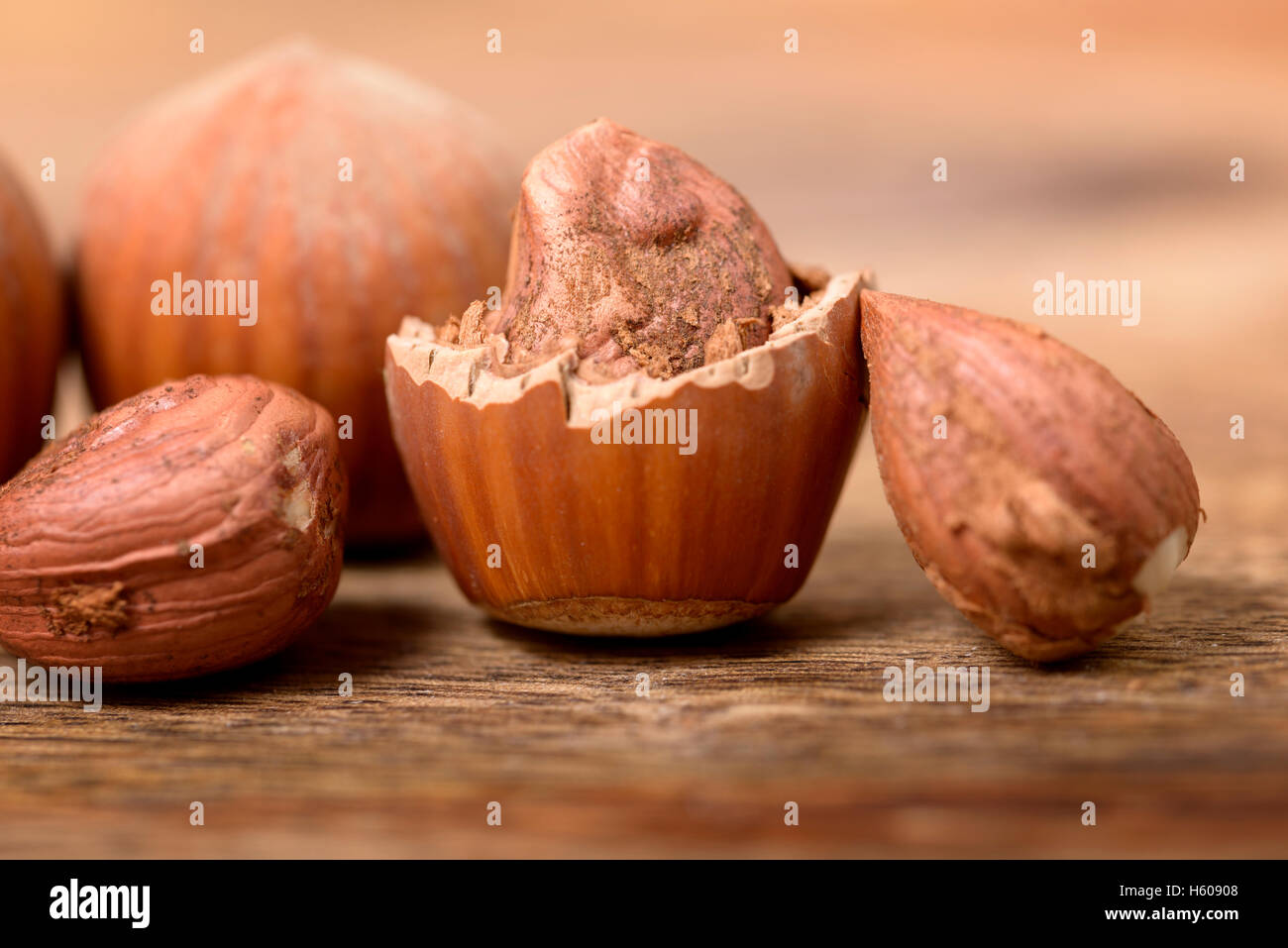 macro hazelnut and nutshell on wooden table Stock Photo - Alamy