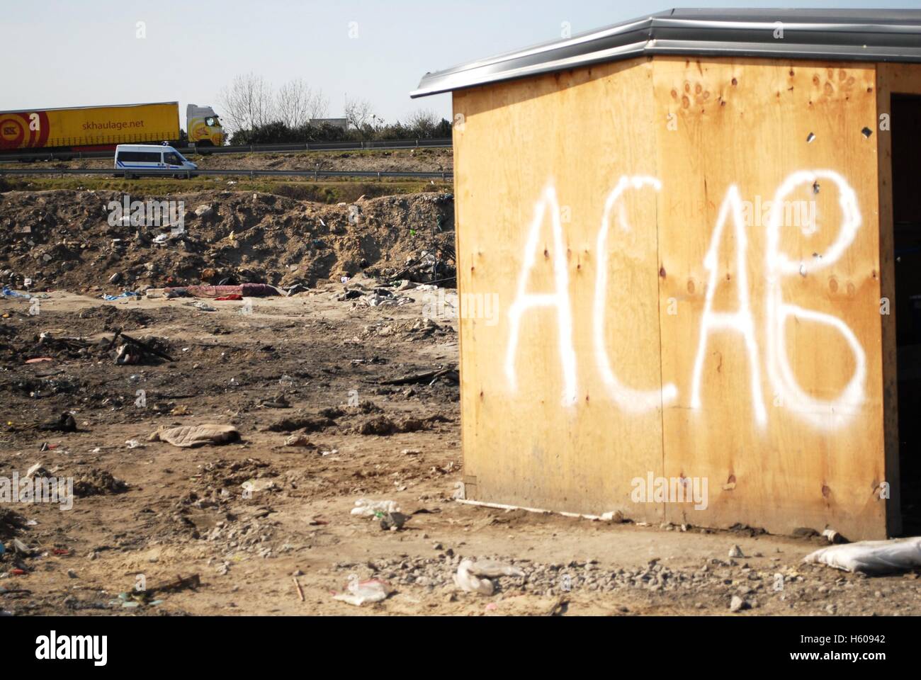 The letters ACAB - All Cops Are Bastards - is sprayed onto the outside ...
