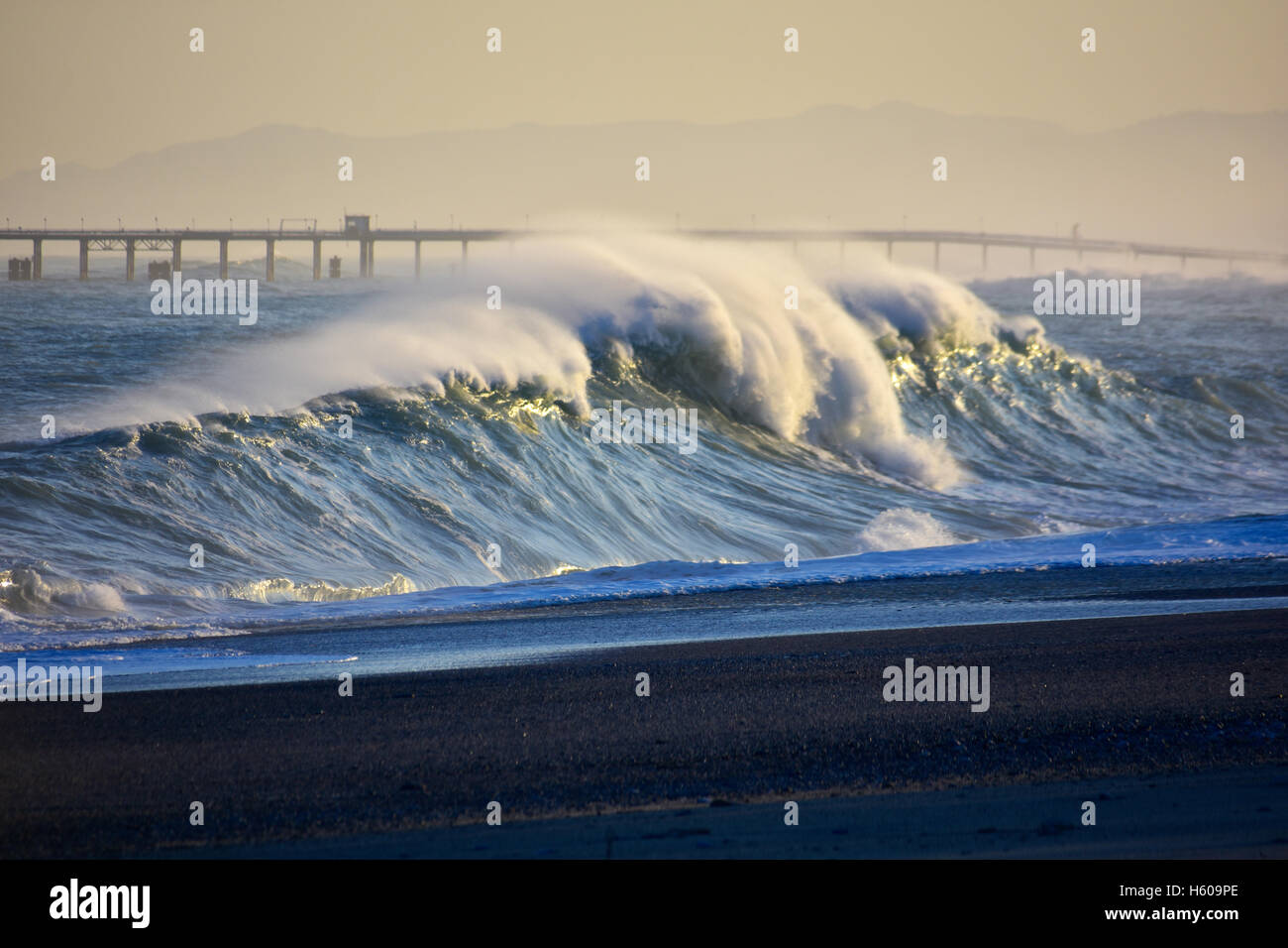 Big wave breaking on the beach Stock Photo - Alamy