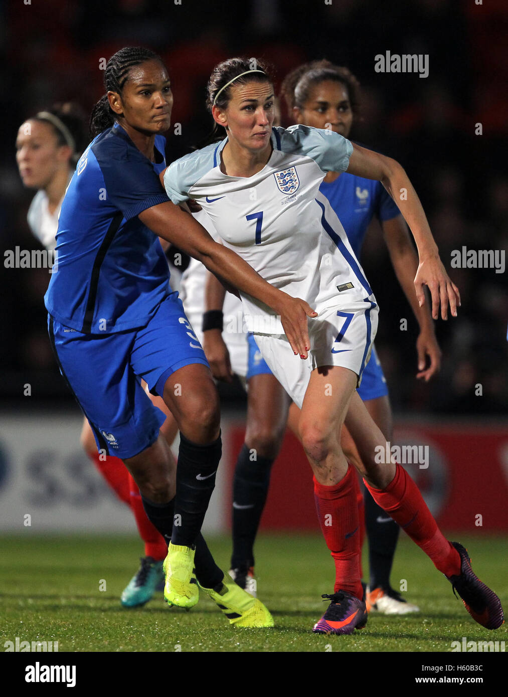 France Women's Wendie Renard (left) and England Women's Jill Scott ...