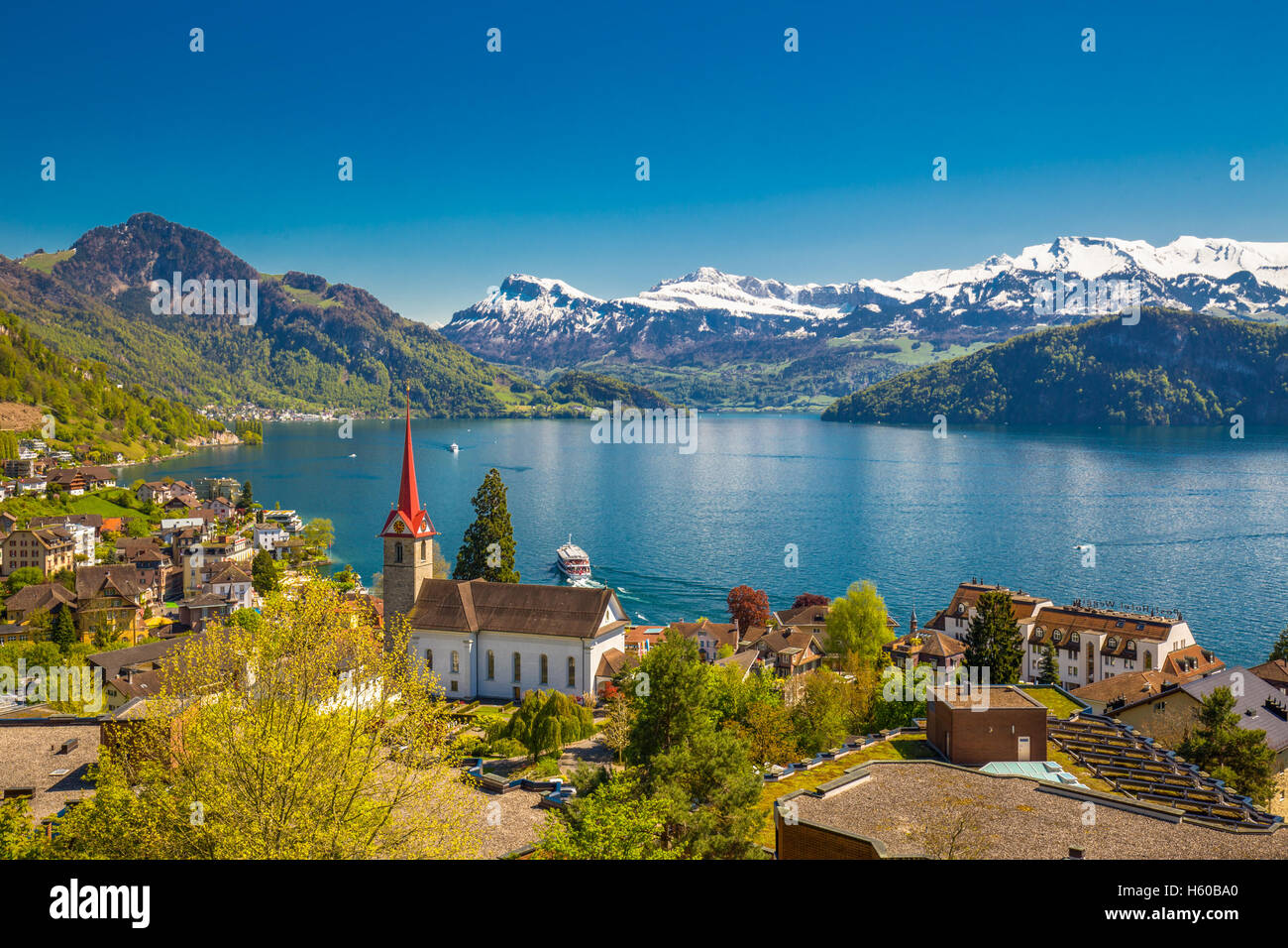 Village Weggis, lake Lucerne and Swiss Alps in the background near ...