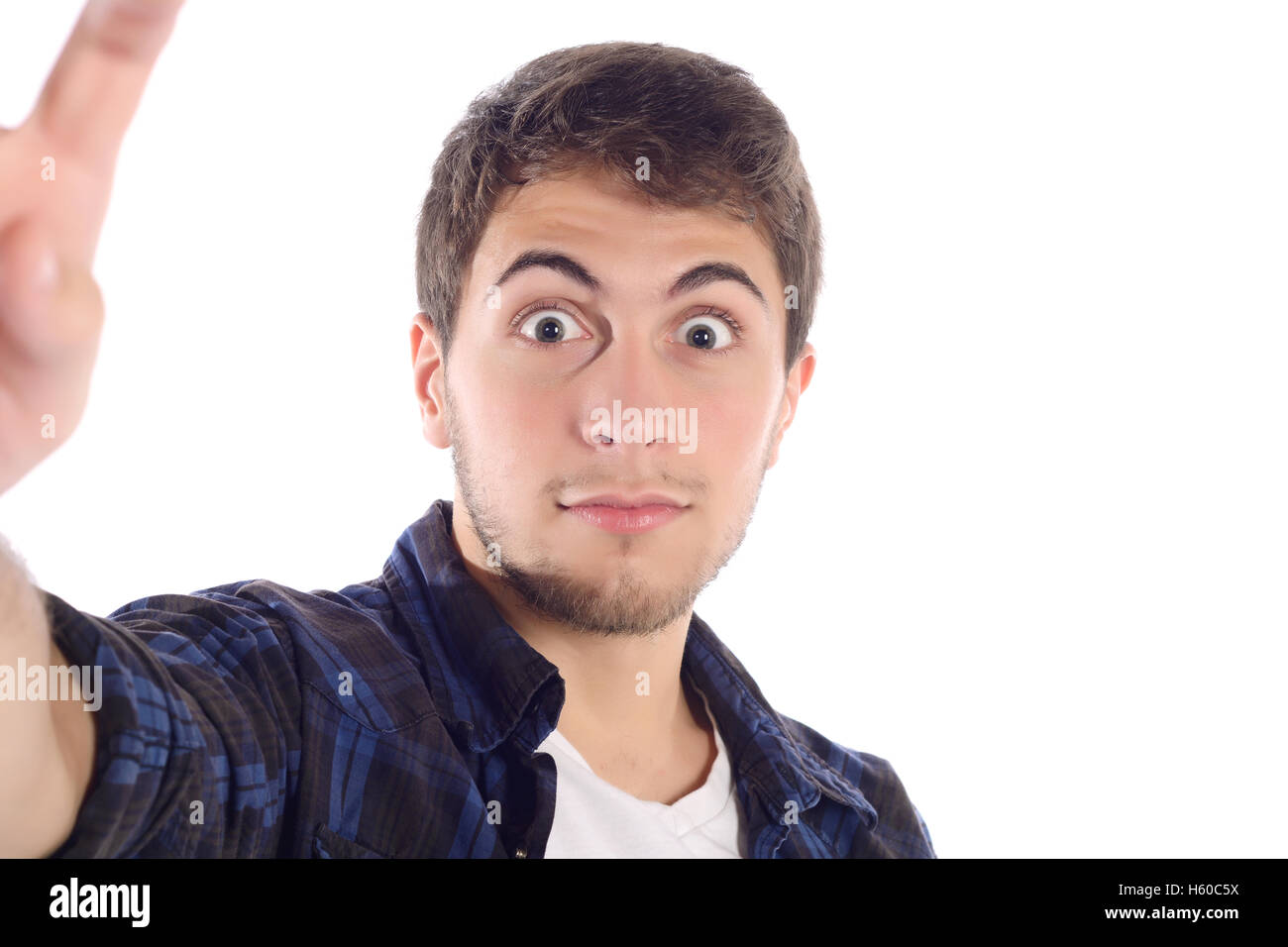 Portrait of a young surprised man Stock Photo - Alamy