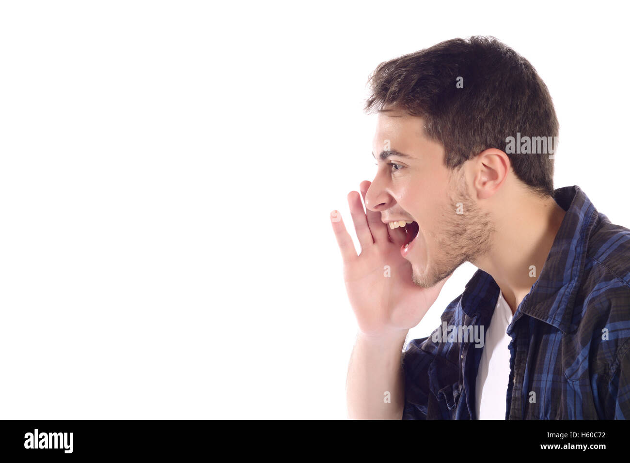 Portrait of a young man shouting. Isolated white background Stock Photo ...