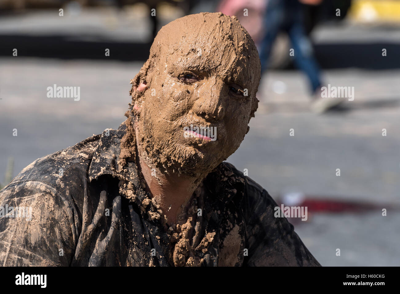 Man covered in black mud hi-res stock photography and images - Alamy