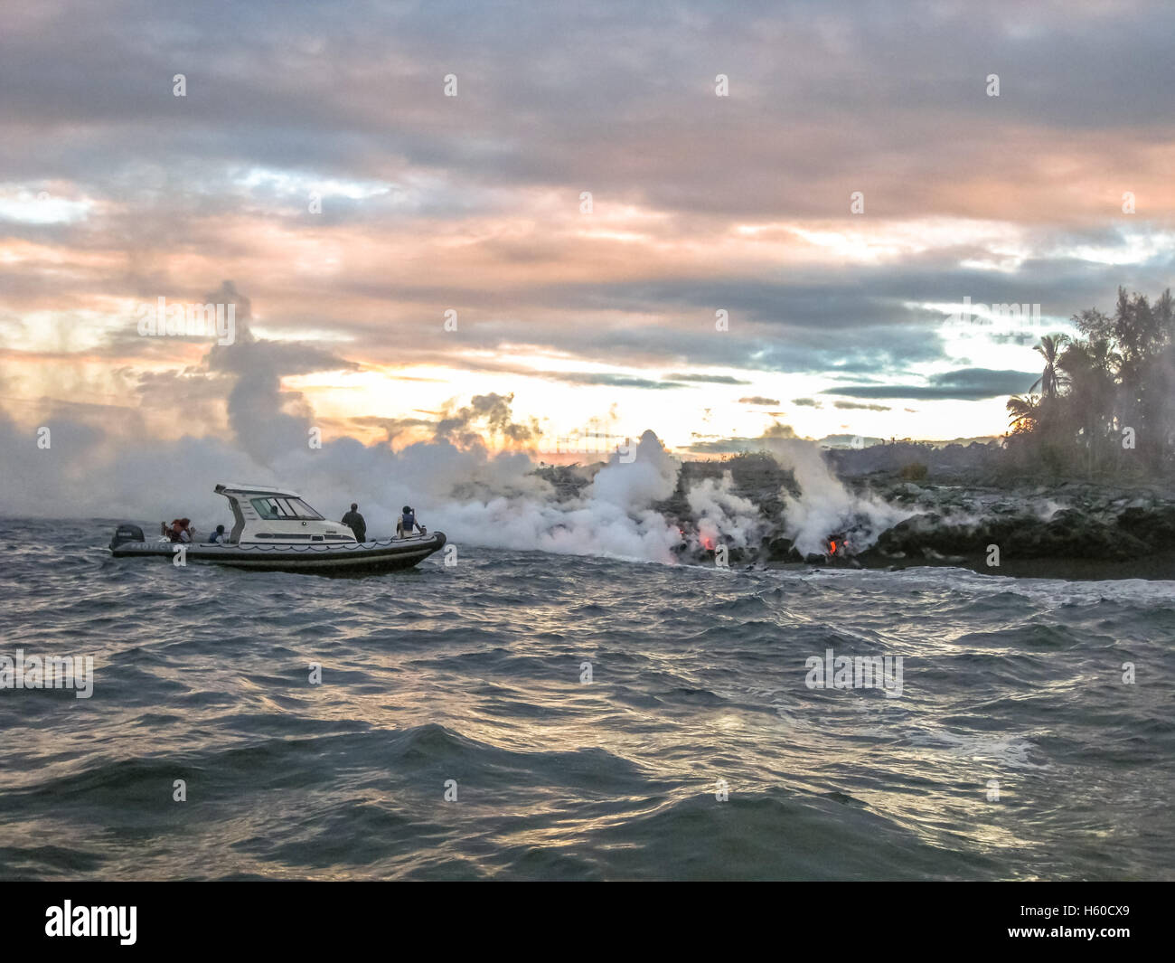 Lava boat tour Hawaii Stock Photo - Alamy